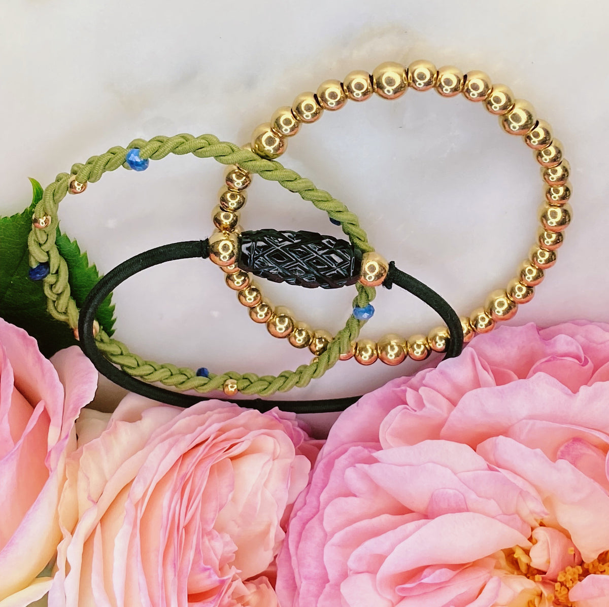 Elegance Redefined: The LBD Onyx and Gold Bracelet – Modern Medusa